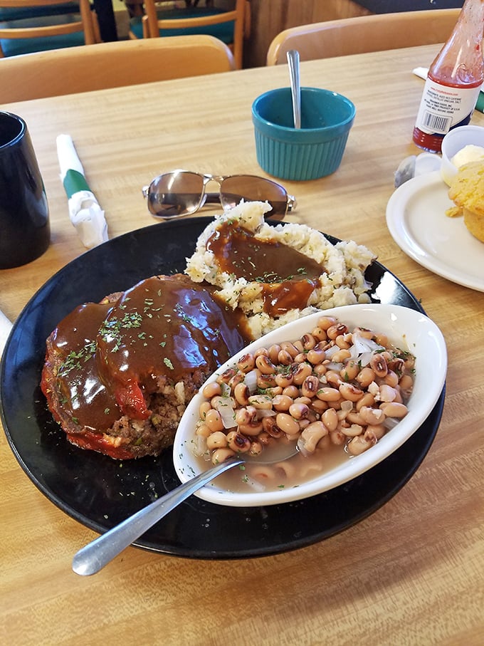 Comfort food that hugs you from the inside. This meatloaf with its glossy gravy is what grandmothers everywhere aspire to create.
