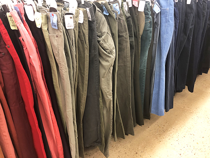 The men's pants section: a rainbow of khakis and jeans that tells the story of American fashion, one waistband at a time.