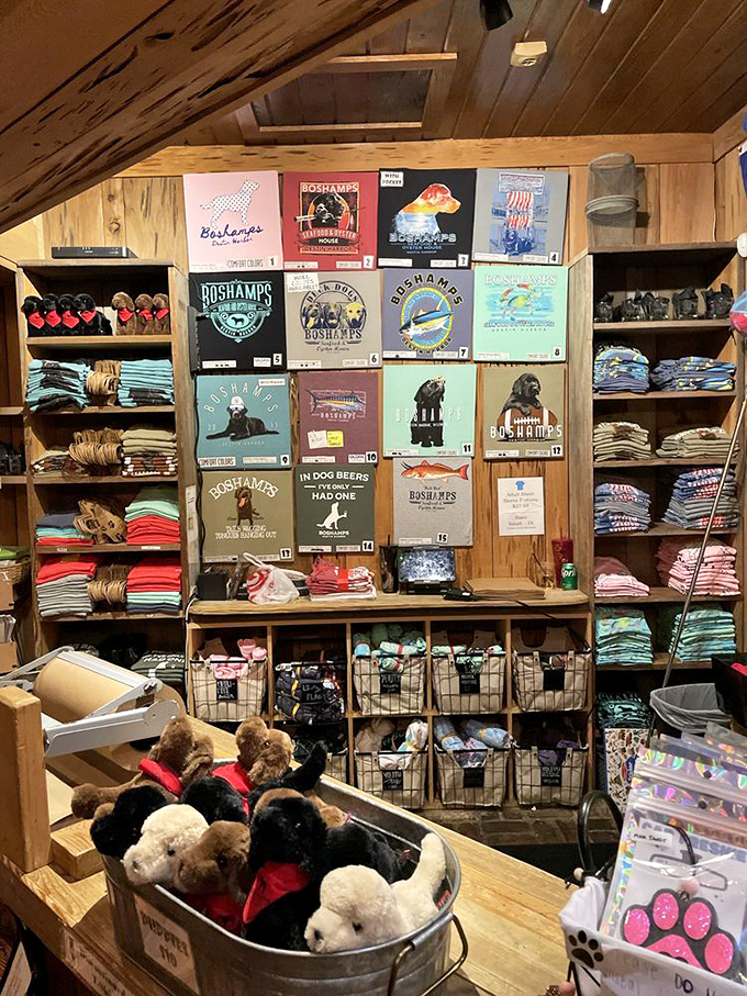 Merchandise wall that screams "I'm not just a restaurant, I'm a lifestyle." Those dog-themed shirts tell you everything about Boshamps' personality.