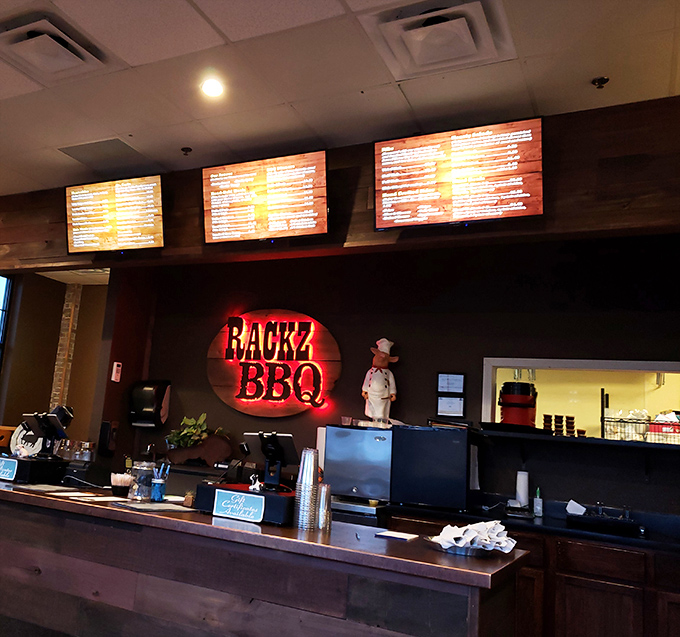 The glowing Rackz sign serves as a beacon of hope for the hungry, while digital menus tempt you with possibilities you hadn't even considered.