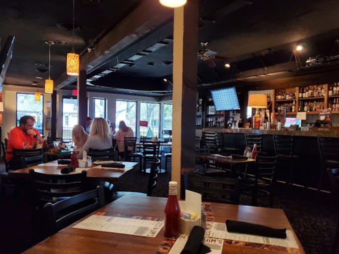 The bar area offers a different vantage point for steak appreciation, with the same no-nonsense approach to delicious dining.