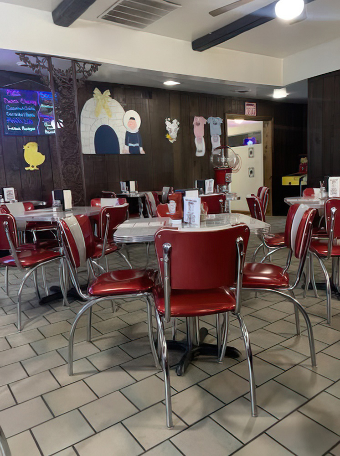 Red chairs, speckled tables, and whimsical wall decorations&mdash;this isn't interior design, it's a warm hug in restaurant form.