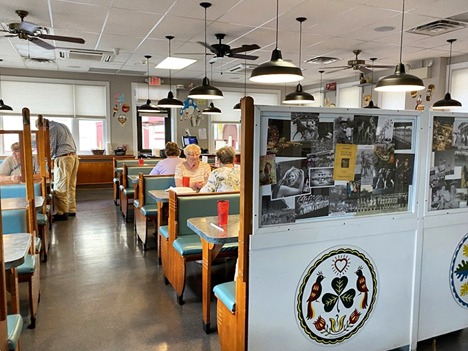 Where memories are made between coffee refills. Those historical photos on the wall aren't decoration—they're previous diners still hanging around.