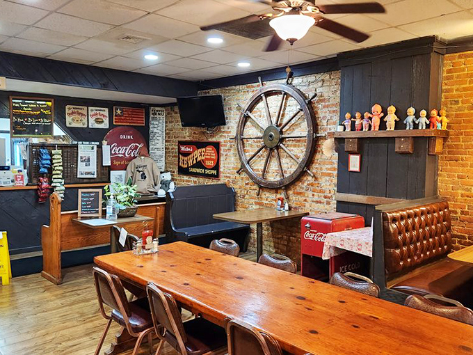 Vintage charm meets modern comfort &ndash; note the ship's wheel and Kewpee dolls watching over diners like quirky guardians.