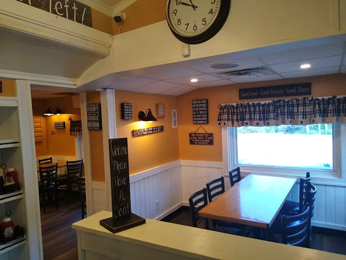 Another angle reveals the warm, inviting atmosphere that makes every customer feel like family.