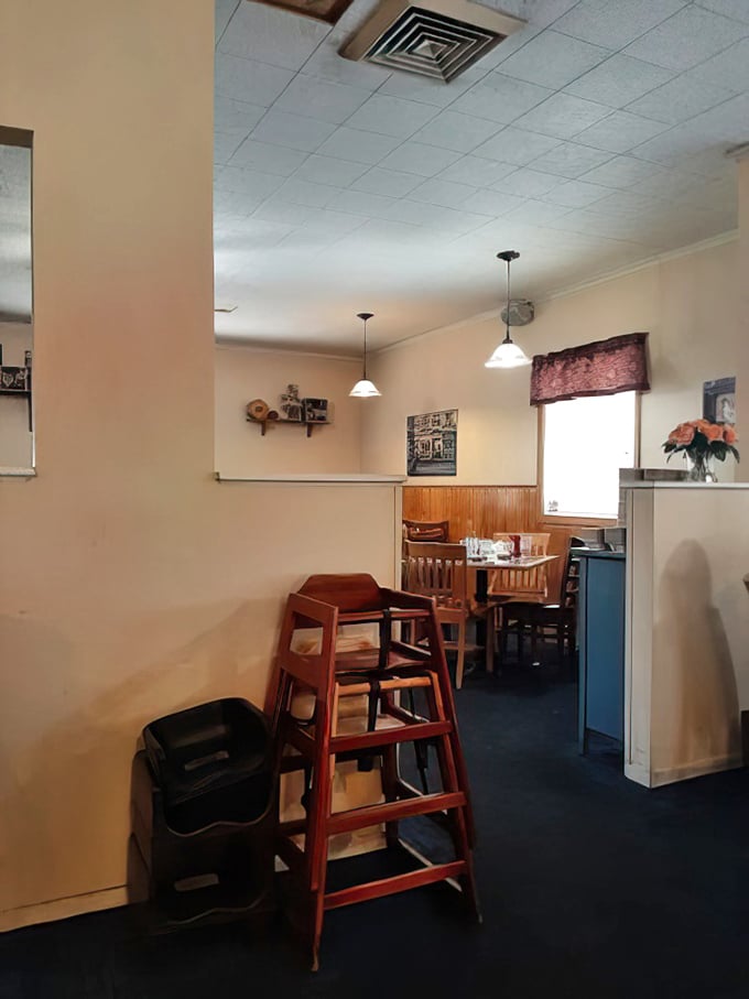 Every small detail&mdash;from the wooden highchair to the pendant lights&mdash;creates that "grandma's kitchen, but bigger" feeling we all crave.