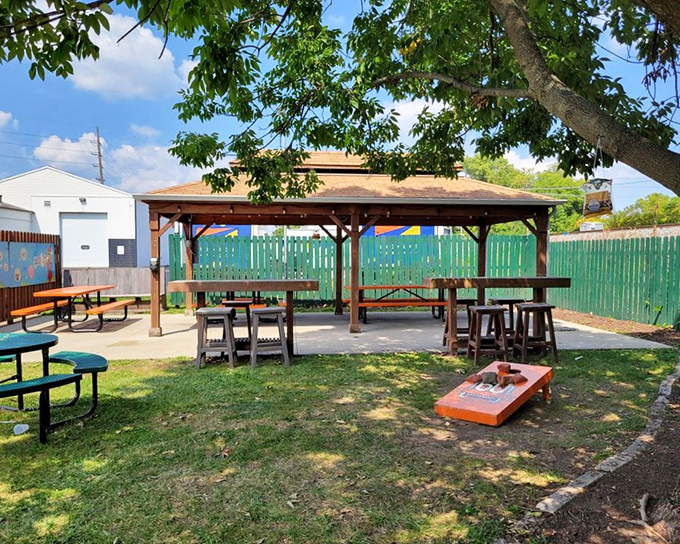 Summer perfection: a shaded pavilion, picnic tables, and the promise of root beer floats just steps away from where you're sitting.