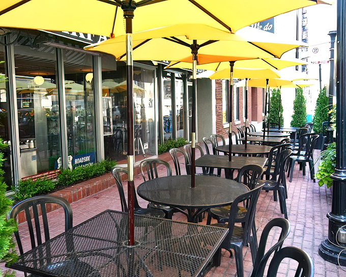The outdoor patio at Lou Mitchell's offers urban dining at its finest &ndash; where breakfast meets fresh air and people-watching becomes an Olympic sport.