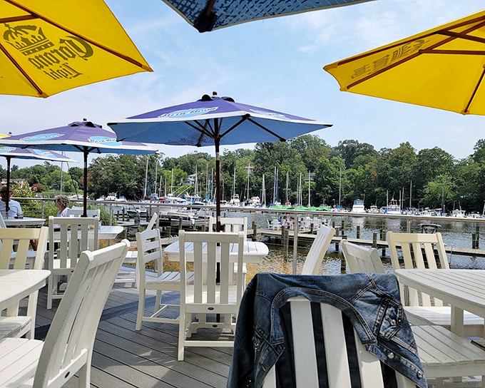 The outdoor deck where summer memories are made, one sunset and seafood platter at a time.