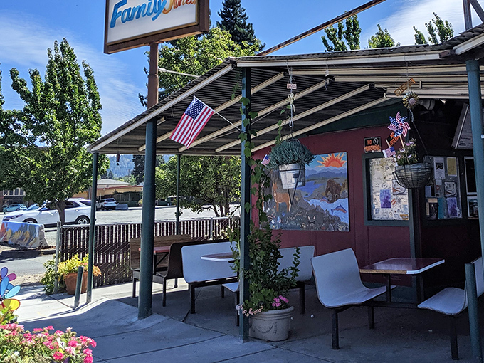 The outdoor patio offers front-row seats to the theater of American roadside dining at its finest.