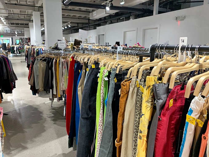 Denim dreams hang in perfect rows like blue-collar poetry written in cotton and thread.