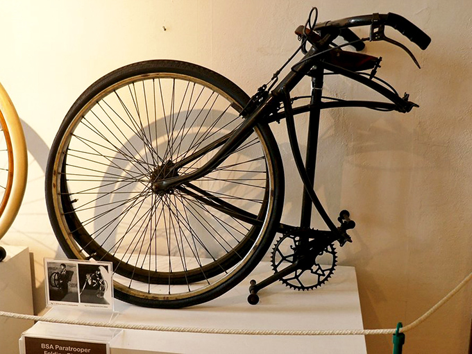 The ingeniously designed BSA Paratrooper folding bicycle allowed WWII soldiers to literally drop into battle zones ready to roll.