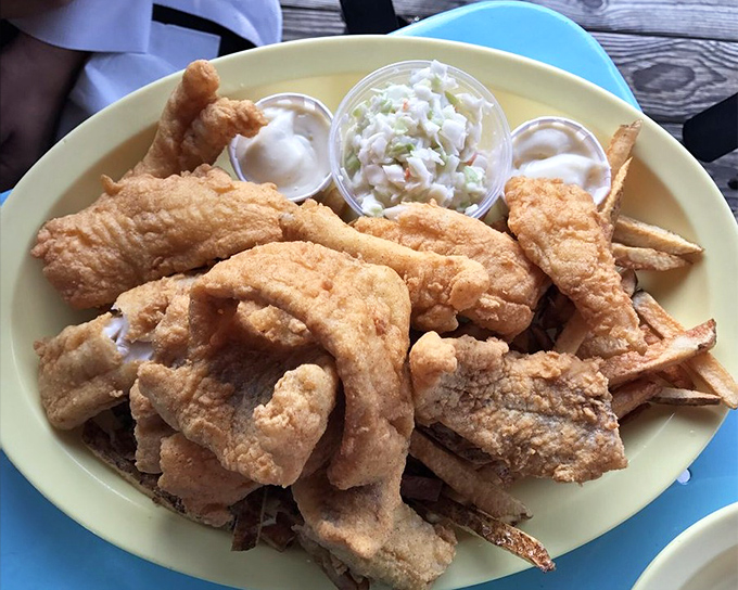 This isn't just fried fish—it's an Ohio tradition served on an orange plate that somehow makes everything taste even better.