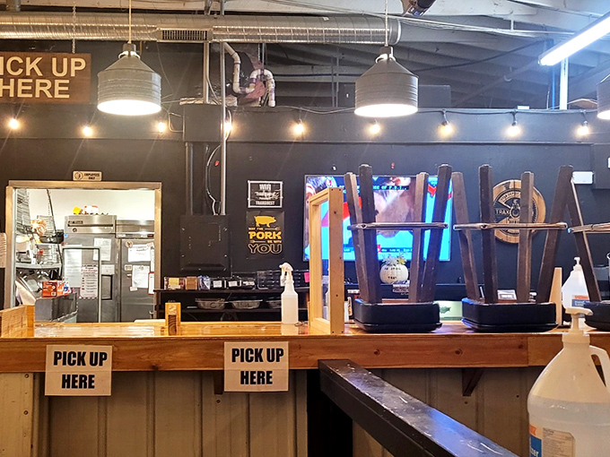 The pickup area&mdash;where dreams come true and patience is rewarded. Those drink dispensers stand like sentinels guarding liquid refreshment.