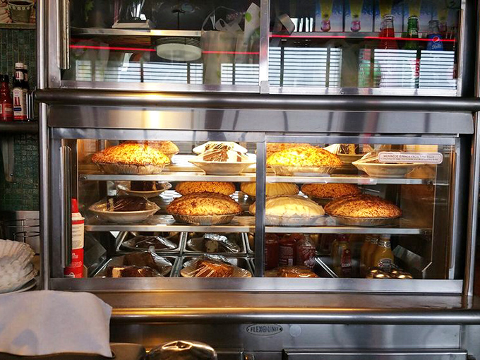The pie case displays tempting treasures that whisper sweet promises to anyone with room for just one more bite.