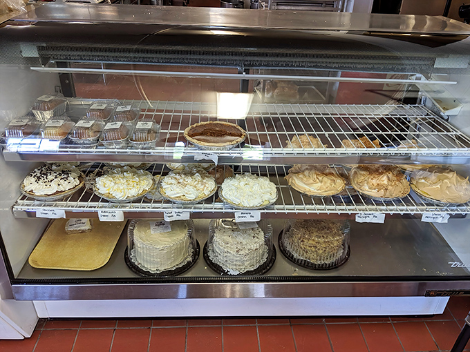 The pie case&mdash;or as I call it, "heaven's display window." Each perfectly crimped crust promises a different path to bliss. 