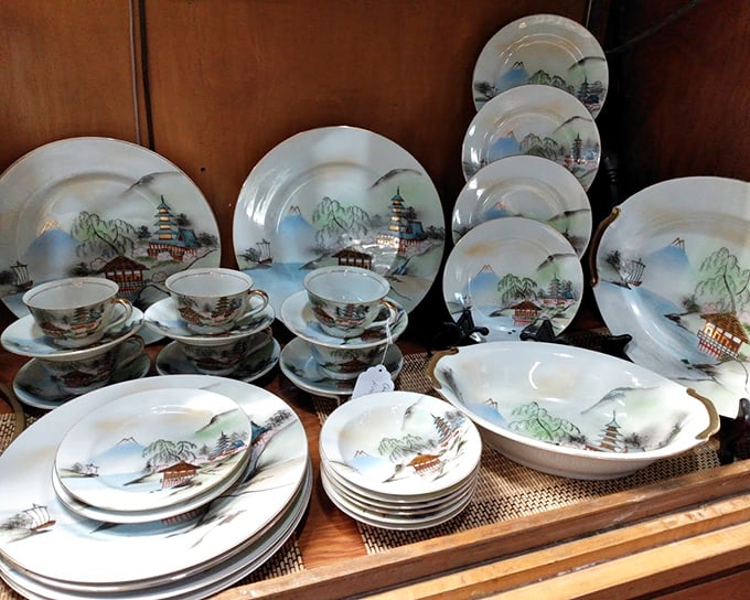 This delicate Asian-inspired dinnerware set awaits a new table to grace. Someone's wedding china becomes another's conversation starter.