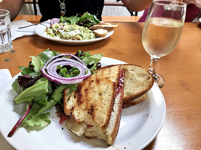 A sandwich that requires both hands and your full attention&mdash;mushrooms and melted cheese creating a vegetarian masterpiece worth writing home about.