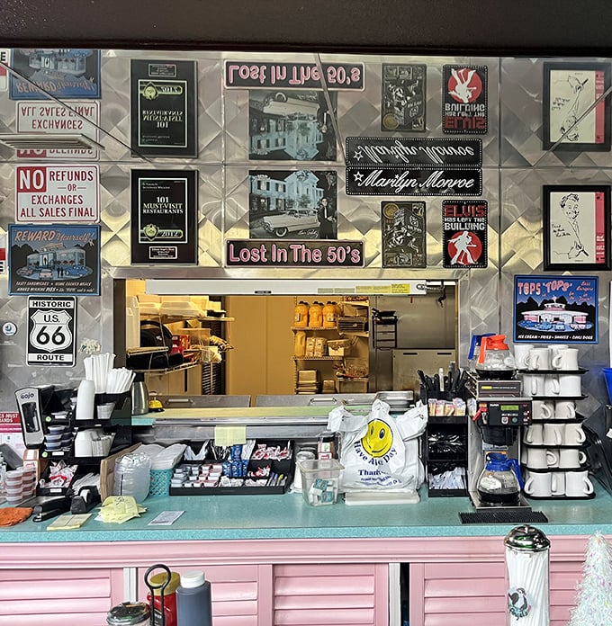 The counter where breakfast dreams come true, complete with 50s memorabilia that makes you half-expect The Fonz to walk in.