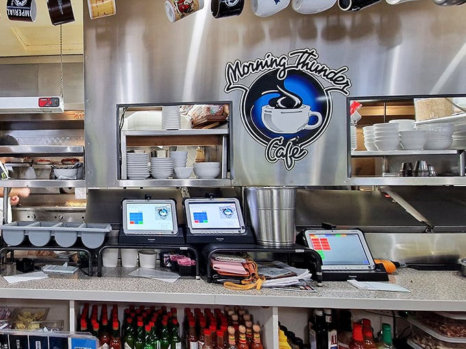 Behind the scenes, the Morning Thunder logo watches over its domain like a caffeinated guardian angel of breakfast delights.