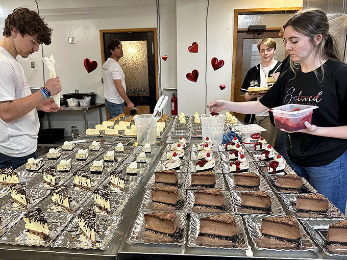 Behind the scenes, the magic happens as dedicated hands transform simple ingredients into slices of joy that will make strangers into friends.