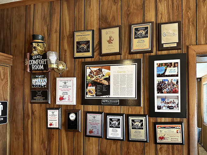 Wall of recognition that tells the story of a restaurant that's earned its place in the community one plate at a time.