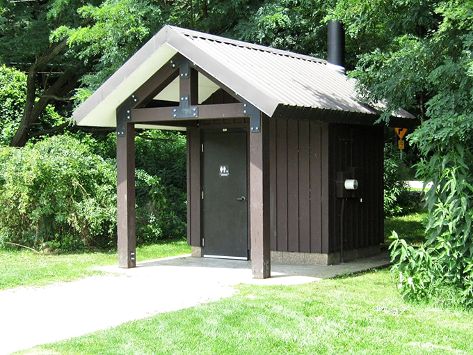 Even practical facilities get the rustic treatment here. This isn't just a restroom&mdash;it's woodland architecture with a purpose.