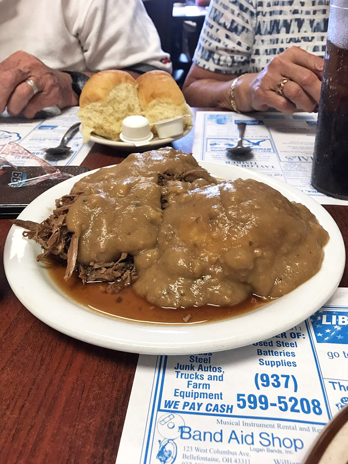 Roast beef swimming in gravy with a side of nostalgia. This plate has probably prevented more family arguments than therapy. 