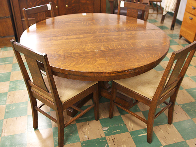 This oak dining table has hosted thousands of family meals and heated Monopoly games. Now it waits for your family's laughter to bring it back to life.