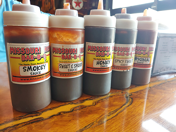 Five sauce bottles standing at attention like delicious soldiers. From "Smokey" to "Spicy Sweet," each one is a different path to flavor nirvana.