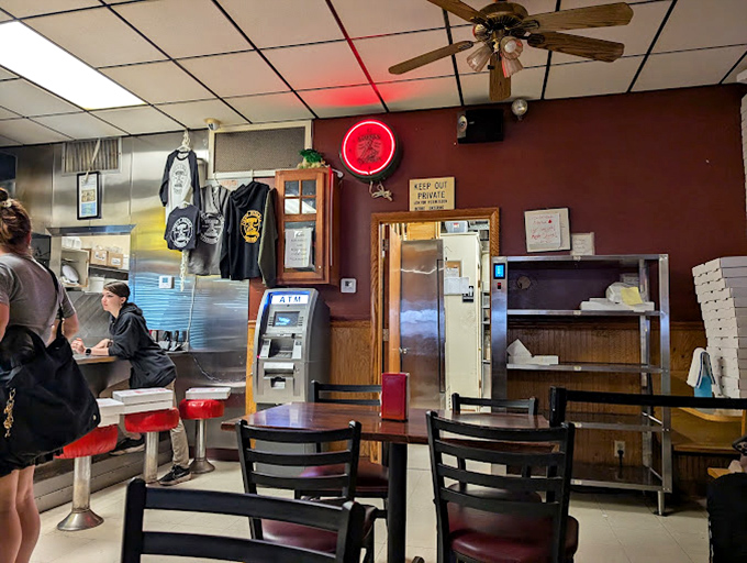 The dining area&mdash;where strangers become neighbors and neighbors become friends&mdash;all united by the universal language of "pass the red pepper flakes."