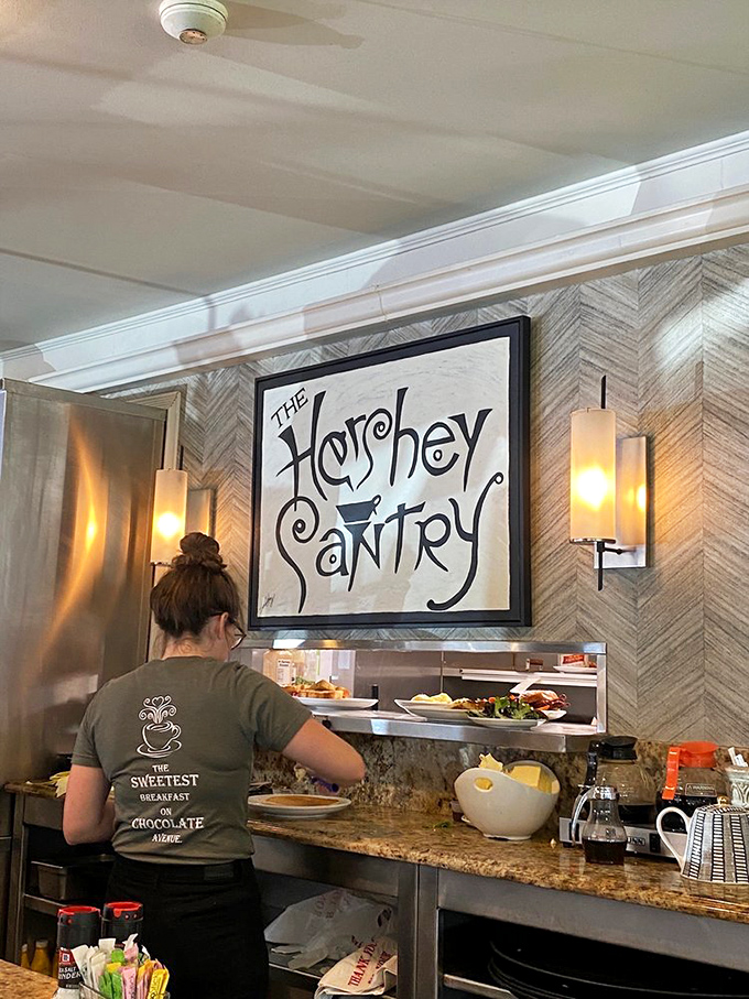 Behind this counter, breakfast magic happens with the precision of a Swiss watch and warmth of home.