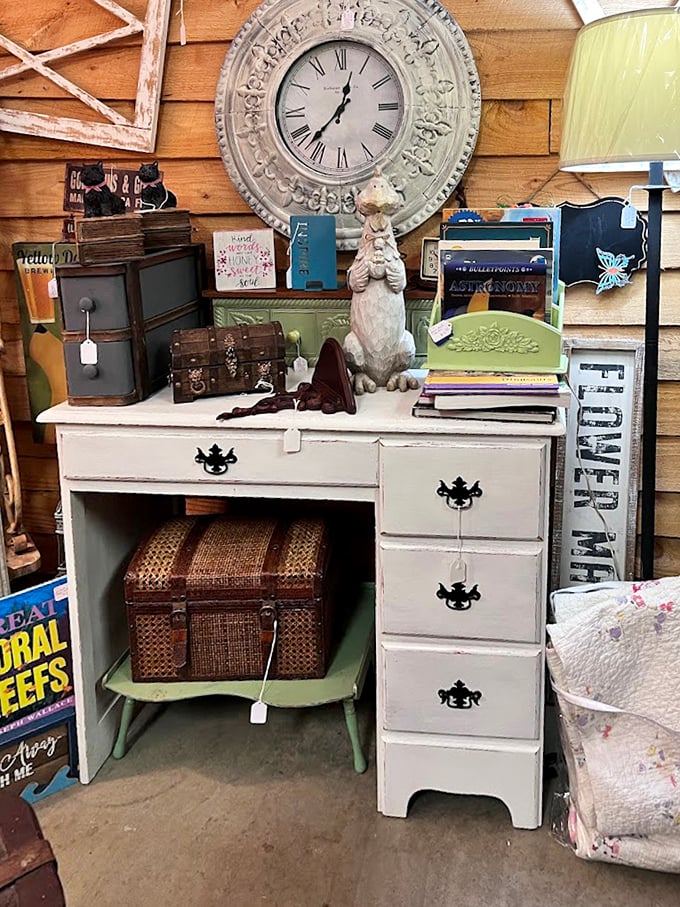 That ornate clock keeps watch over a shabby chic desk that's seen decades of letters written, bills paid, and dreams sketched out.