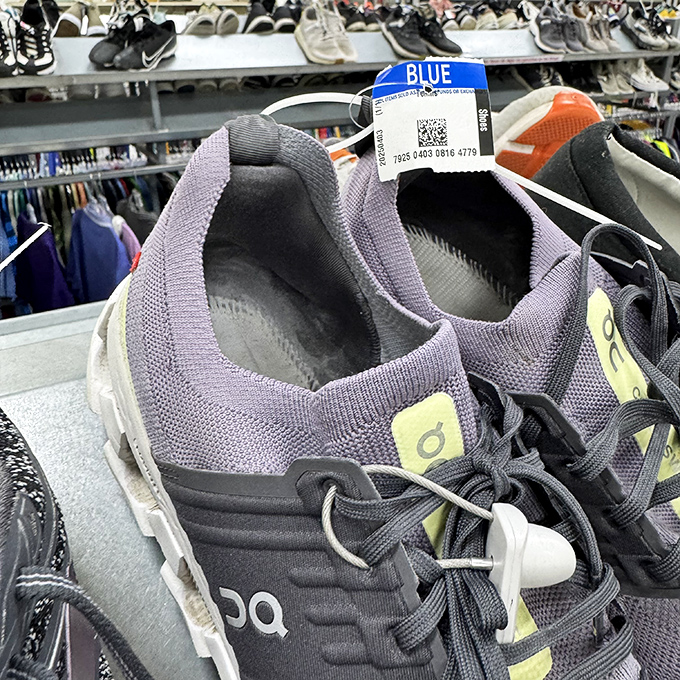 Athletic shoes with plenty of miles left in them, sporting the blue tag that signals another bargain hunter's potential victory.