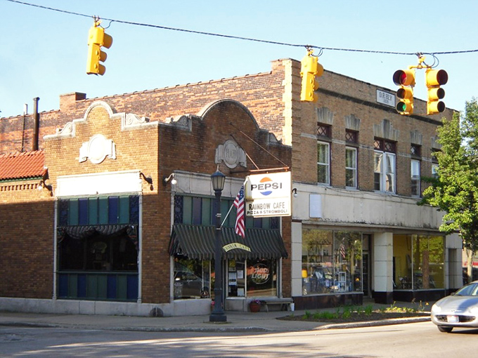 The Rainbow Caf&eacute; sits at an intersection where everyone knows your coffee order before you've fully settled into your seat. 
