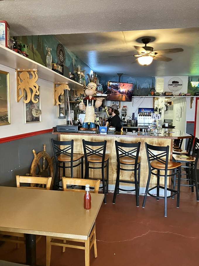 Wooden octopus decorations watch over diners from their perch&mdash;silent guardians of this temple to seafood excellence.