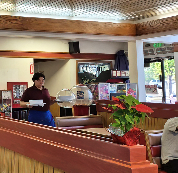 Where the magic happens. The staff moves with the practiced efficiency of people who know they're creating memories, not just meals.