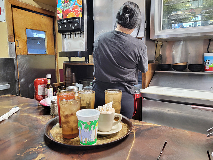 Behind every great diner is a staff that moves with the precision of dancers who've memorized their steps over thousands of performances.