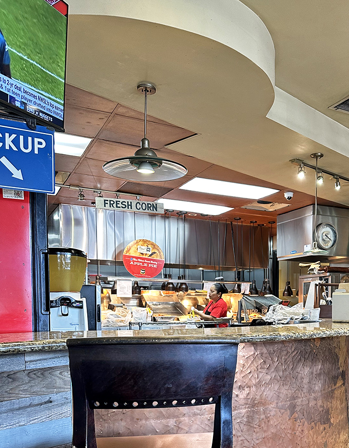 Where the magic happens. These kitchen wizards transform simple ingredients into crispy, juicy masterpieces daily.