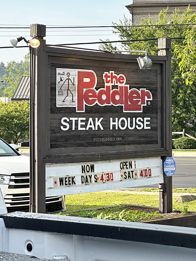 The Peddler's sign stands proud against Carolina blue skies. Like a meaty lighthouse guiding hungry souls to beefy salvation.