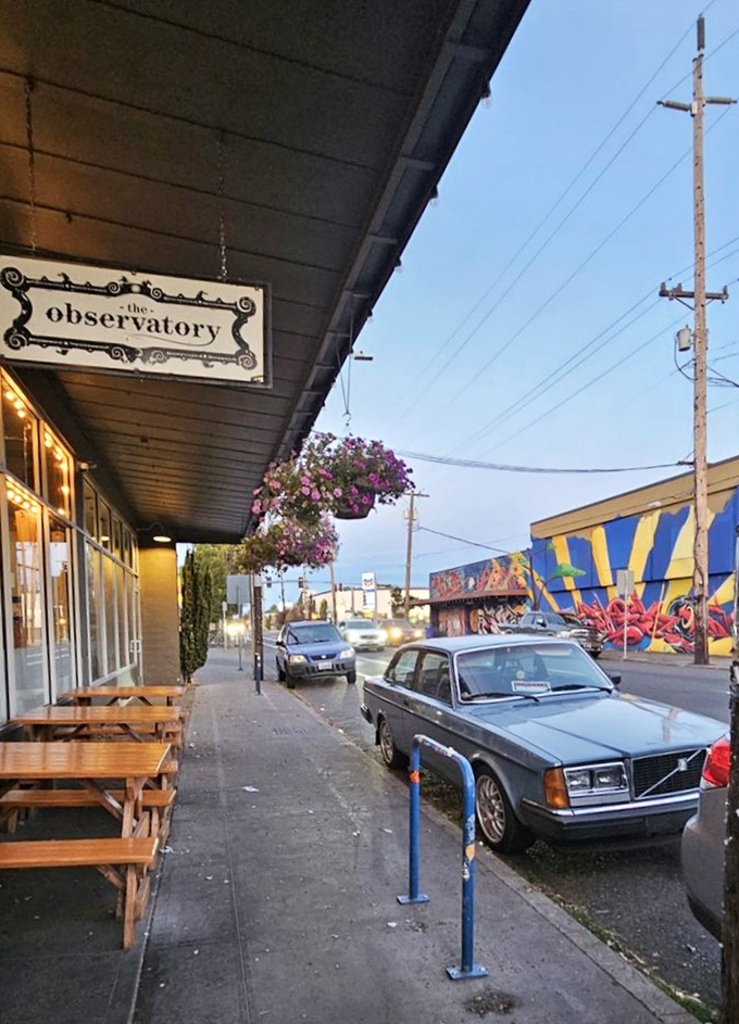 Even the vintage Volvo parked outside seems to know this is the coolest spot on the block.