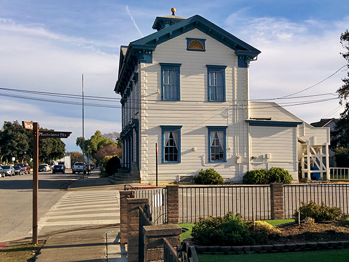 The Windmill Market's weathered wooden facade tells you you're in for something authentic. No corporate cookie-cutter shopping here.