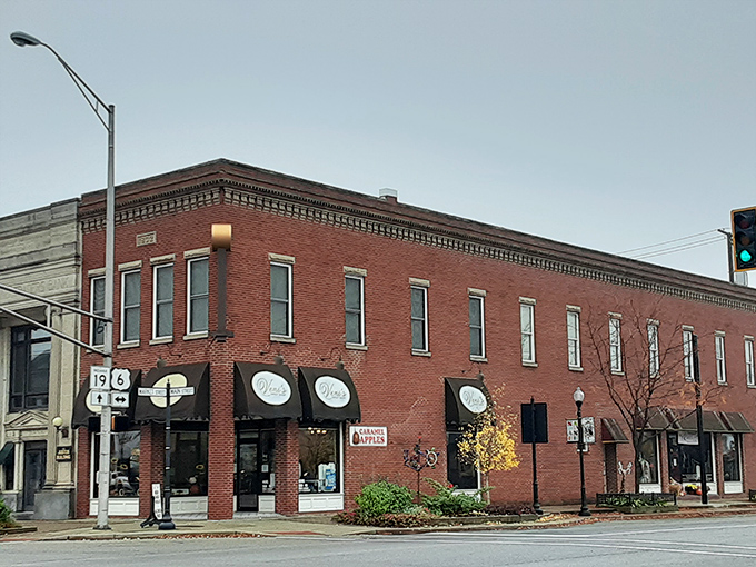 Red brick beauty with awnings that welcome. These historic buildings don't just house businesses &ndash; they frame the daily life of a community.