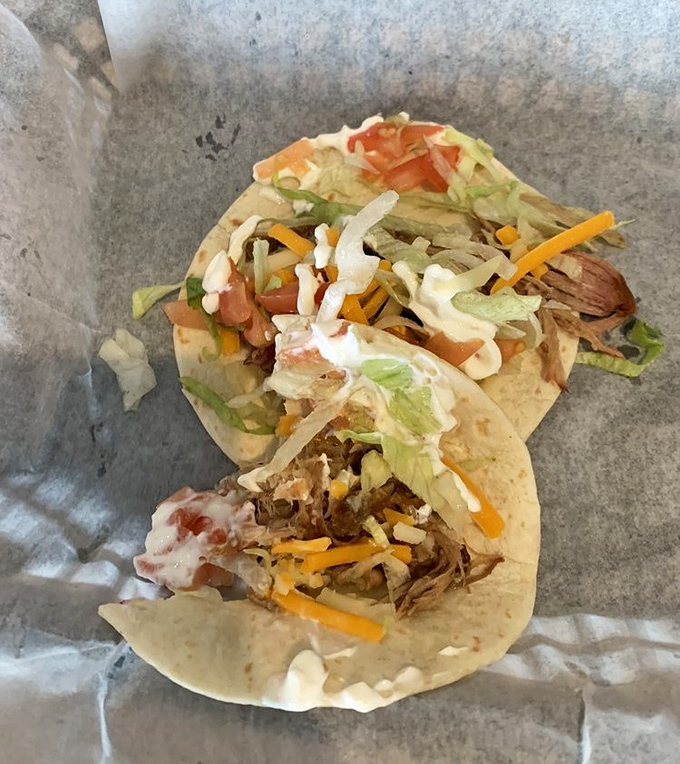 Barbecue tacos prove that great smoke knows no borders, wrapped in tortillas with fresh, colorful toppings.
