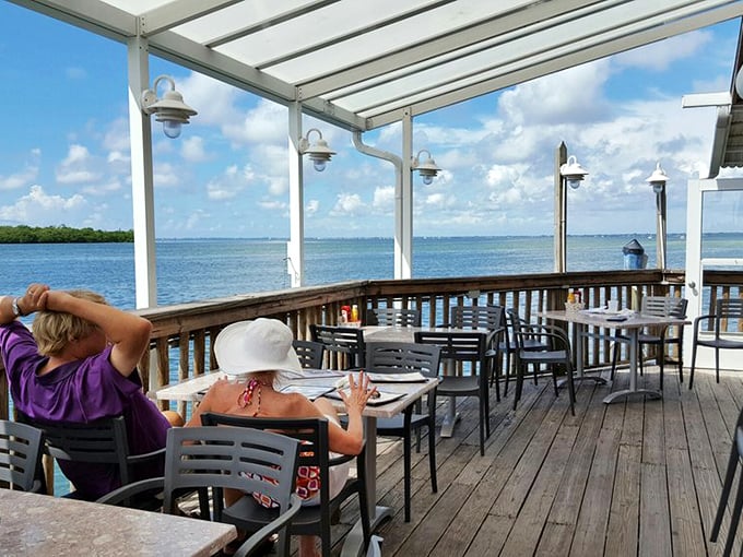 Dining with a view that no interior designer could replicate. Mother Nature provides the backdrop while your seafood arrives with a side of sunshine.