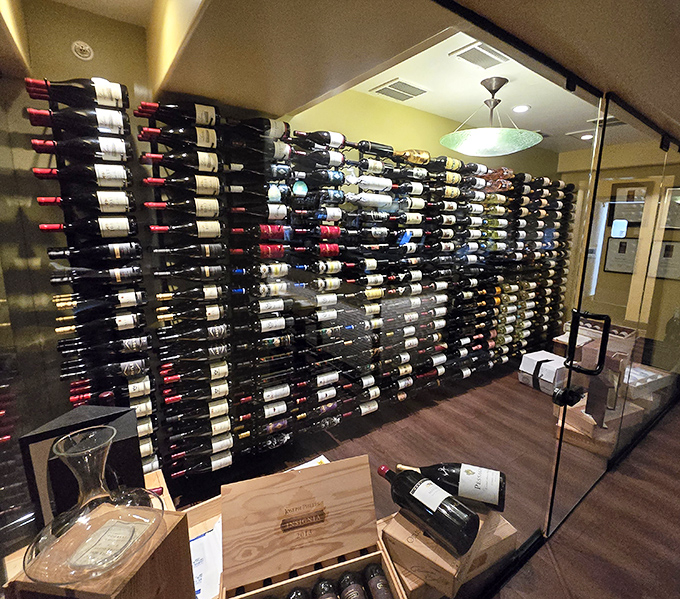 A wine wall that would make Bacchus himself weep with joy—California's finest vintages standing at attention, awaiting your selection.