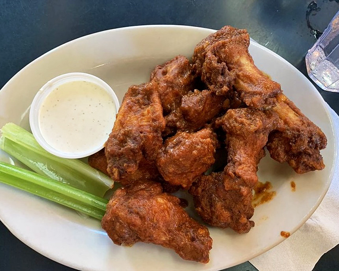 These wings aren't just crispy, they're having an identity crisis about whether they're potato chips&mdash;served with cooling celery and creamy dipping sauce.