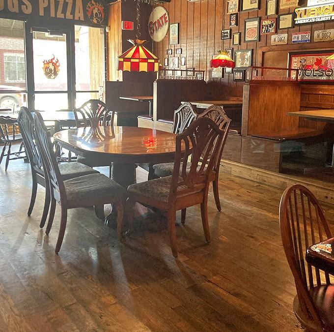 Another angle reveals the warm atmosphere where pizza dreams come true every single day.