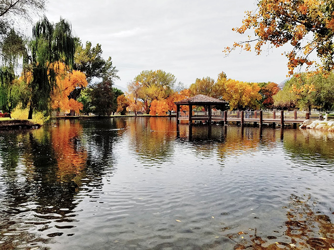Bishop's park pond reflects fall colors like nature's own Instagram filter &ndash; no technology required for these perfect views.