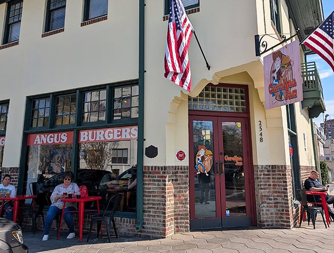Carolina Jax's historic building and patriotic flair create an inviting burger destination. Those red tables add a festive touch!